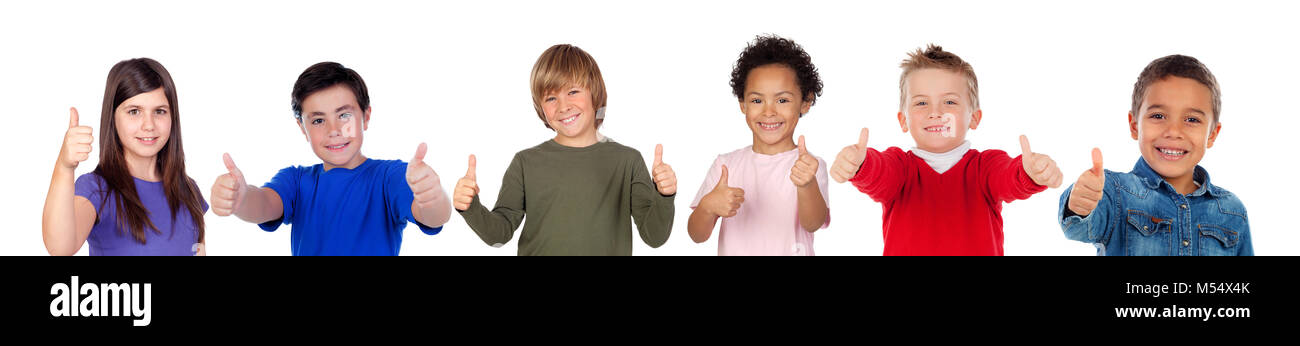 Happy children saying Ok with their thumbs isolated on a white ...