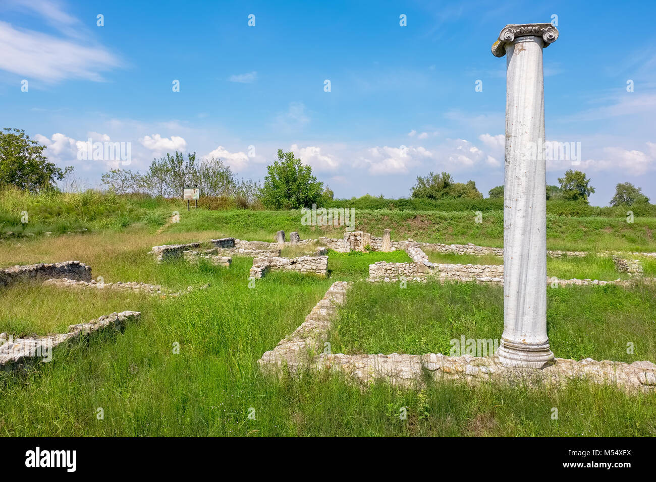 Landscape with column and ancient walls at Dion Archeological Site ...