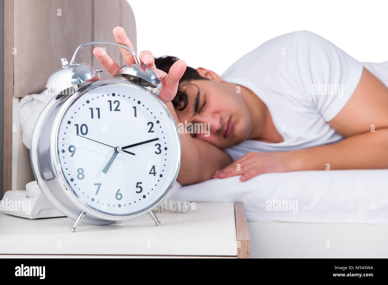 The man in bed suffering from insomnia Stock Photo - Alamy