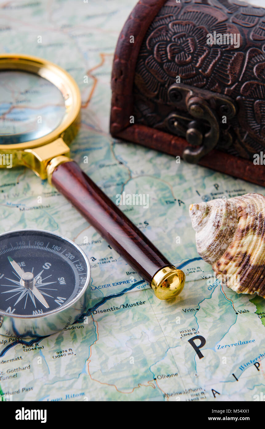The travel concept with compass and map Stock Photo - Alamy