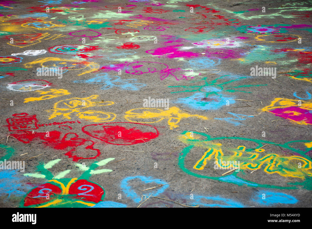 Thai children play and painting powder color on ground in Bang Mod ...