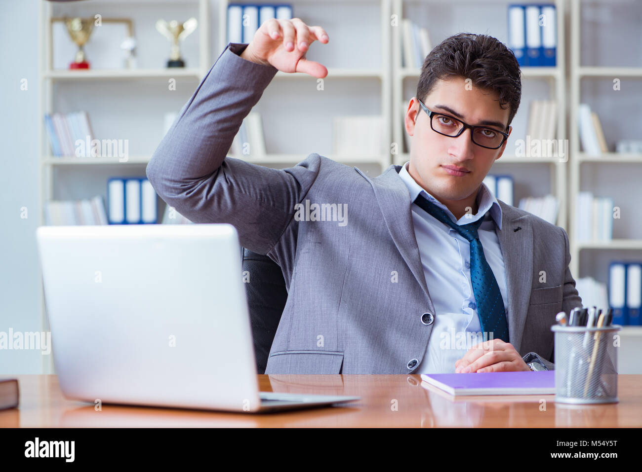 Businessman sweating excessively smelling bad in office at workp Stock ...