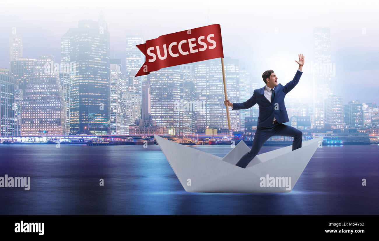 The businessman riding paper boat ship in success concept Stock Photo ...