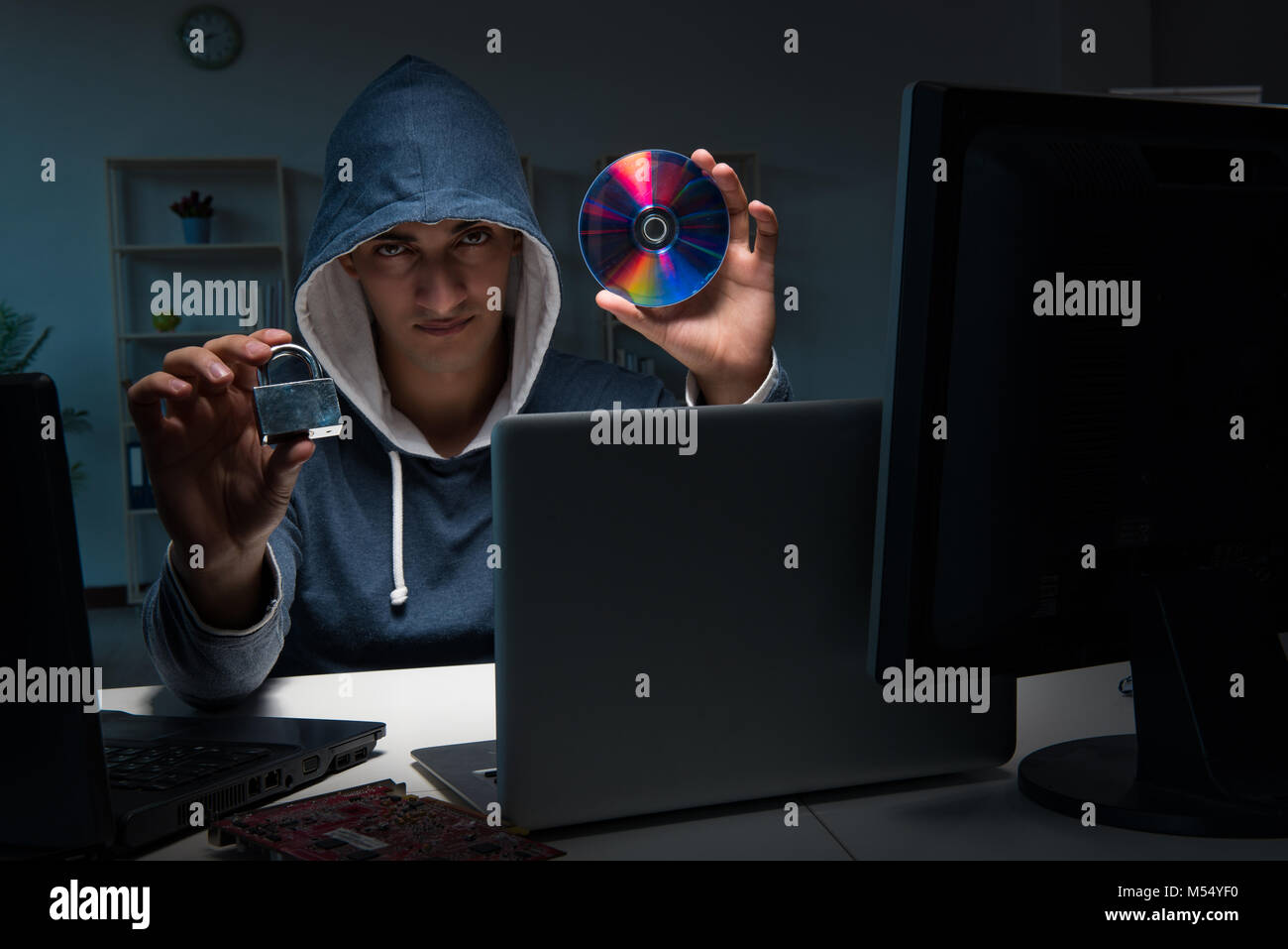 The hacker hacking computer at night Stock Photo - Alamy