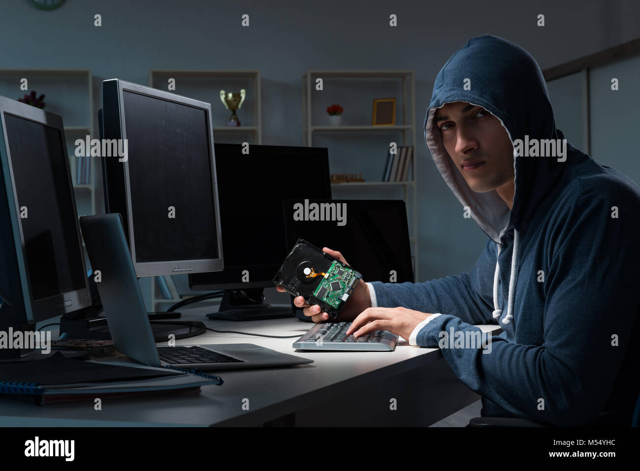 The hacker hacking computer at night Stock Photo - Alamy