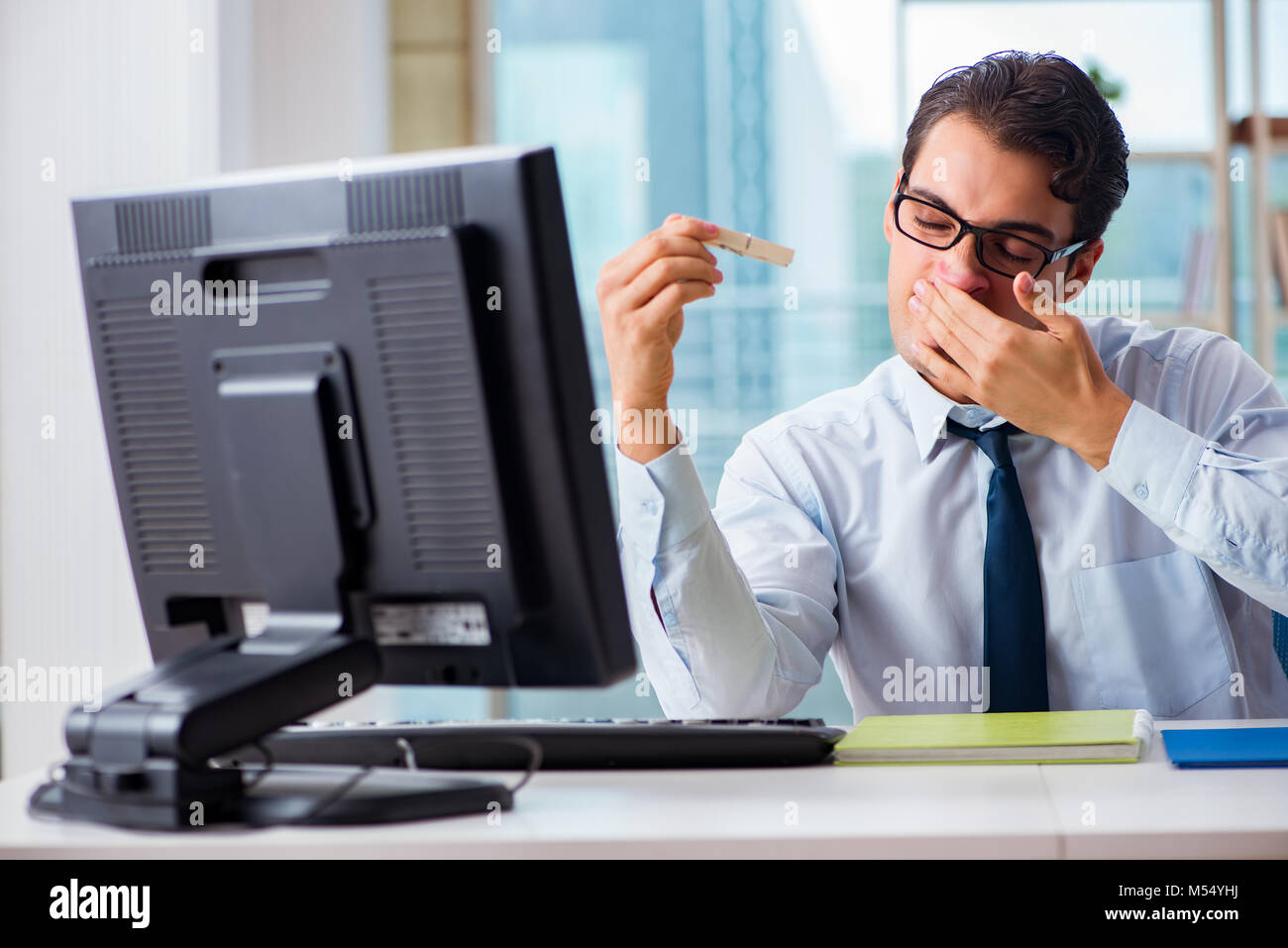 The businessman suffering from excessive armpit sweating Stock Photo ...