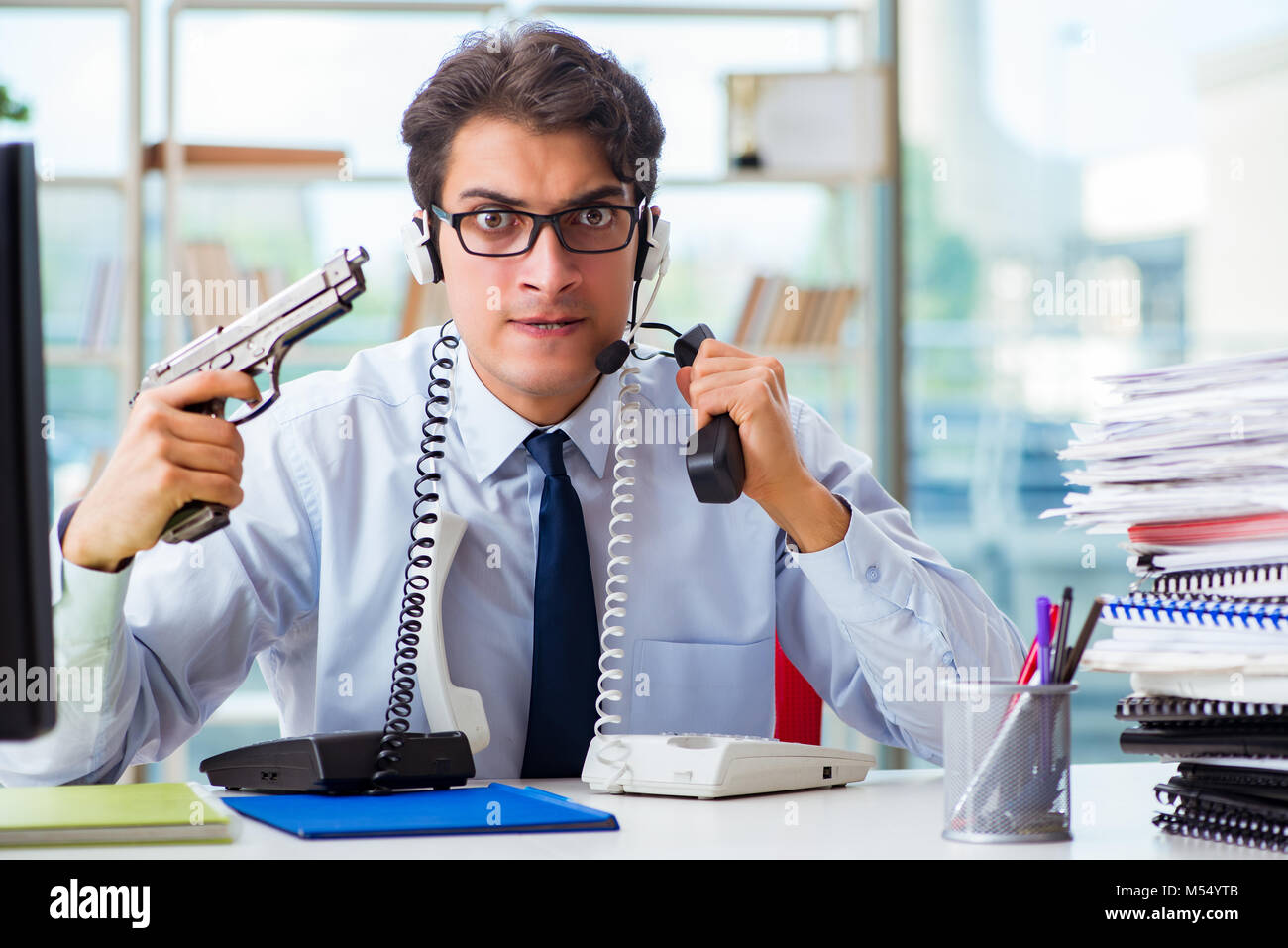 The unhappy angry call center worker frustrated with workload Stock ...
