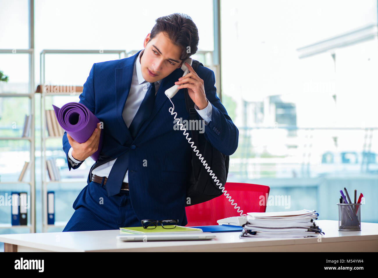 The man getting ready for sports break in the office Stock Photo - Alamy