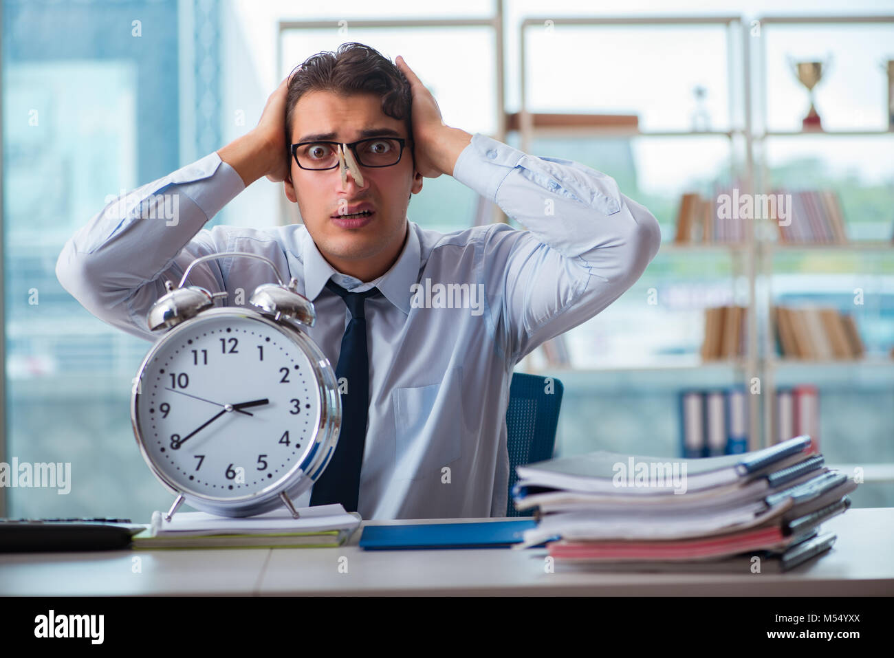 The businessman suffering from excessive armpit sweating Stock Photo ...