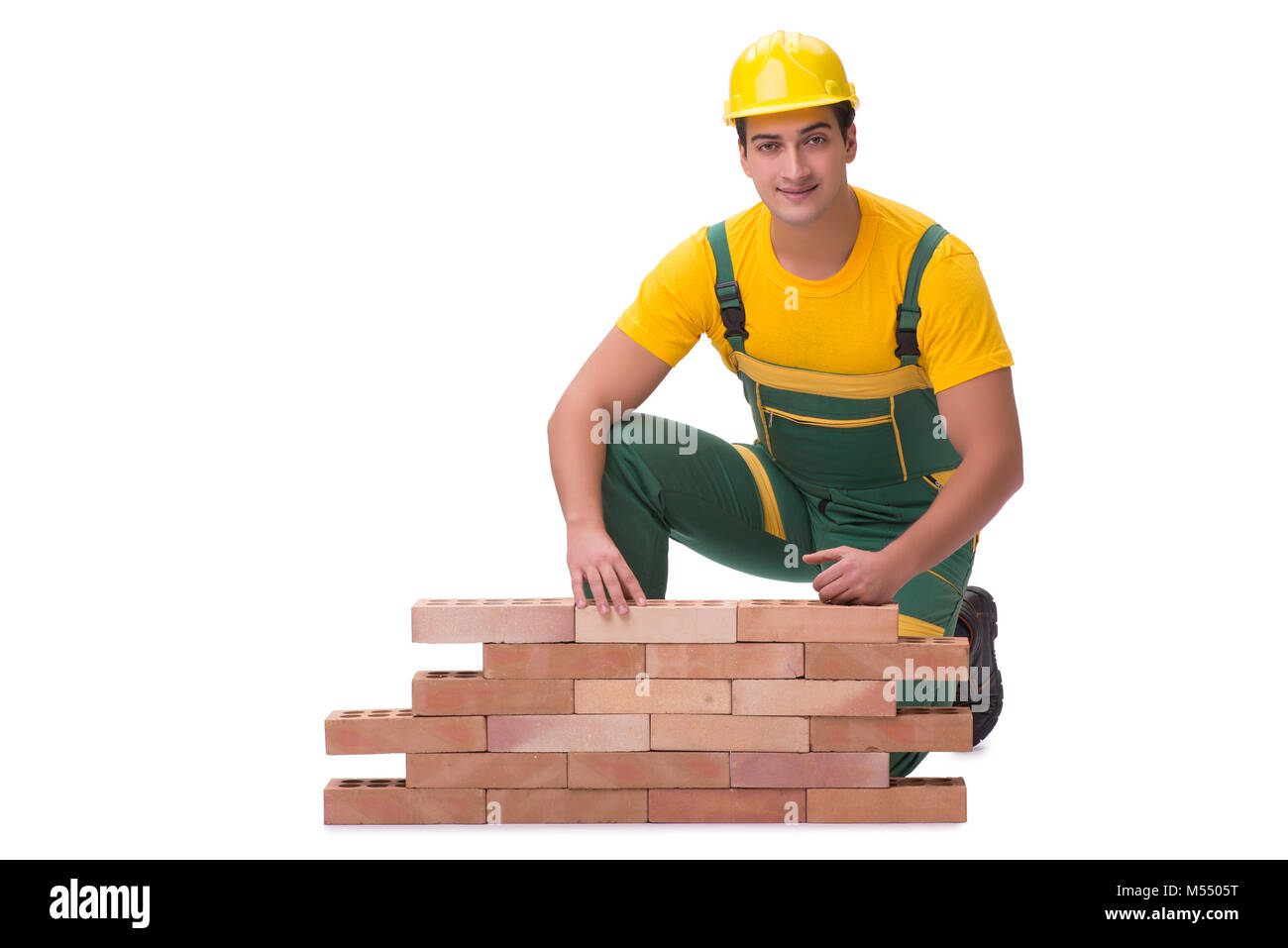 Construction site worker laying Cut Out Stock Images & Pictures - Alamy