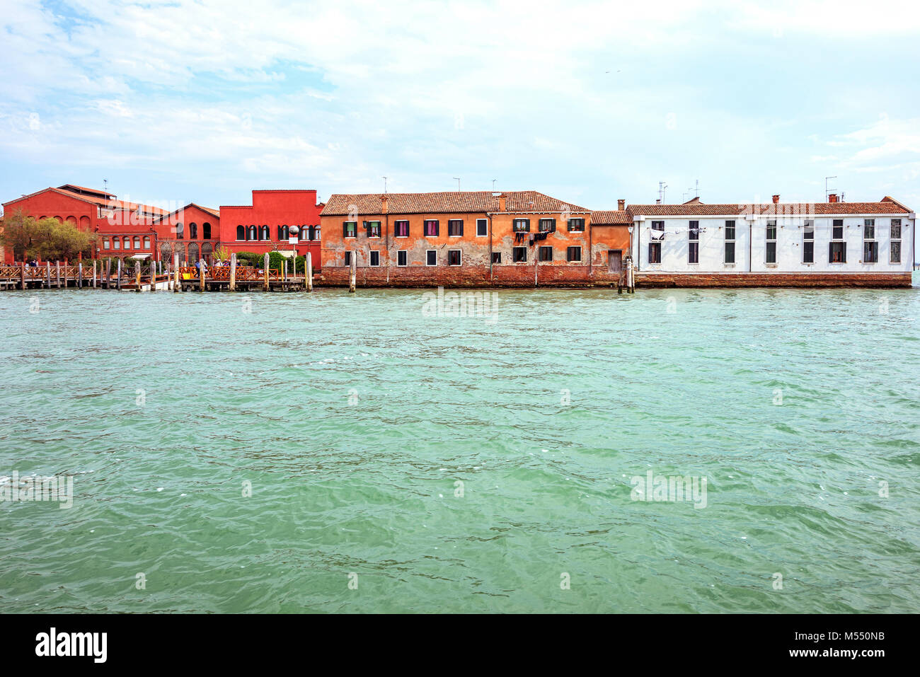 Daylight view from boat to historic architecture buildings in sunny day ...