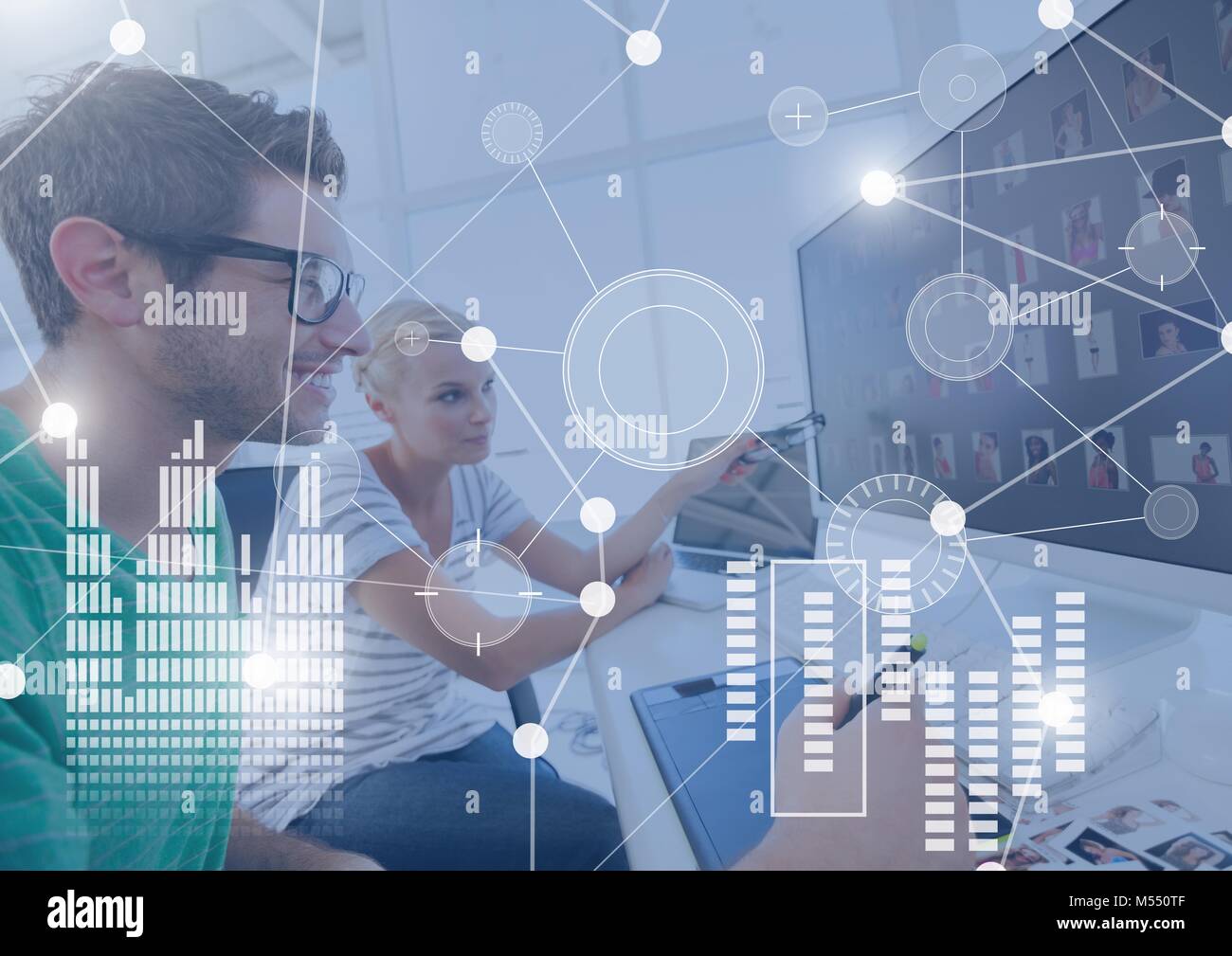 Business Overlay Interface with people on computer Stock Photo - Alamy