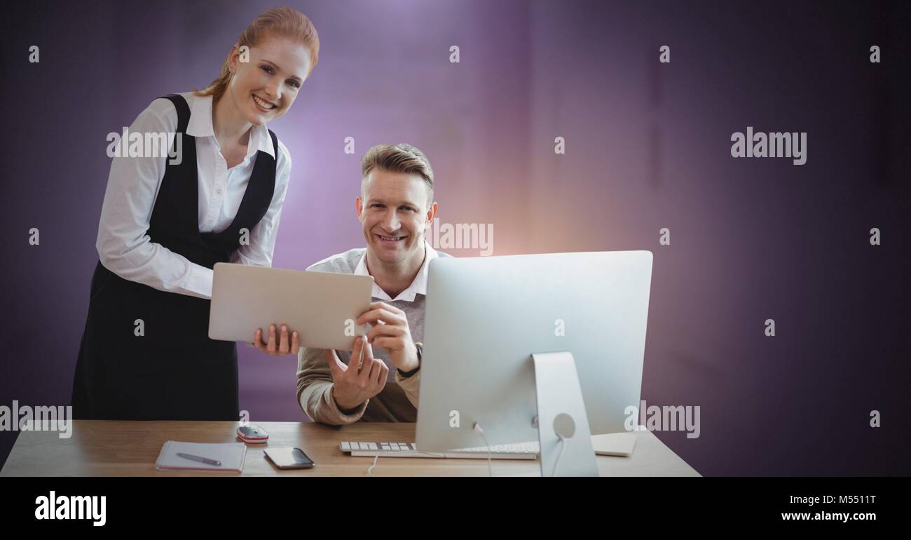 Business couple working on computer Stock Photo - Alamy