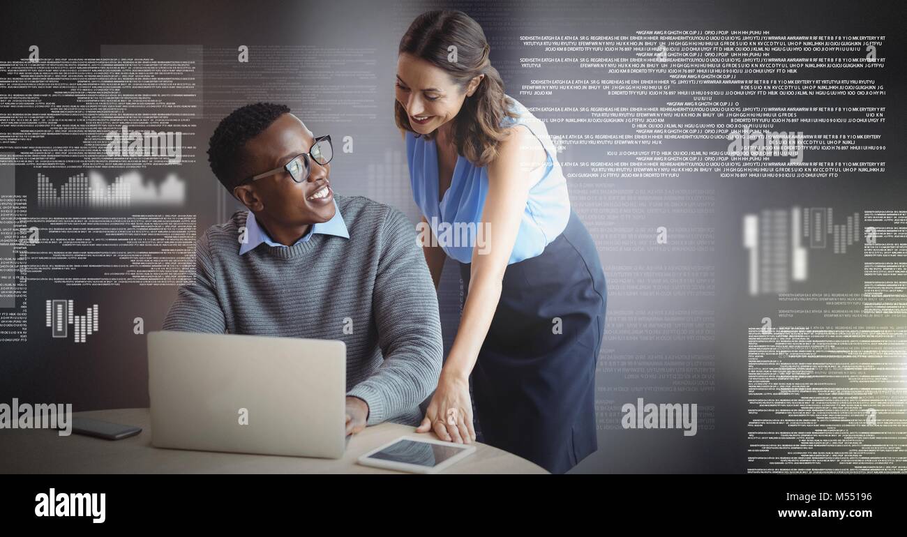 Business couple working on laptop with screen text interface Stock ...