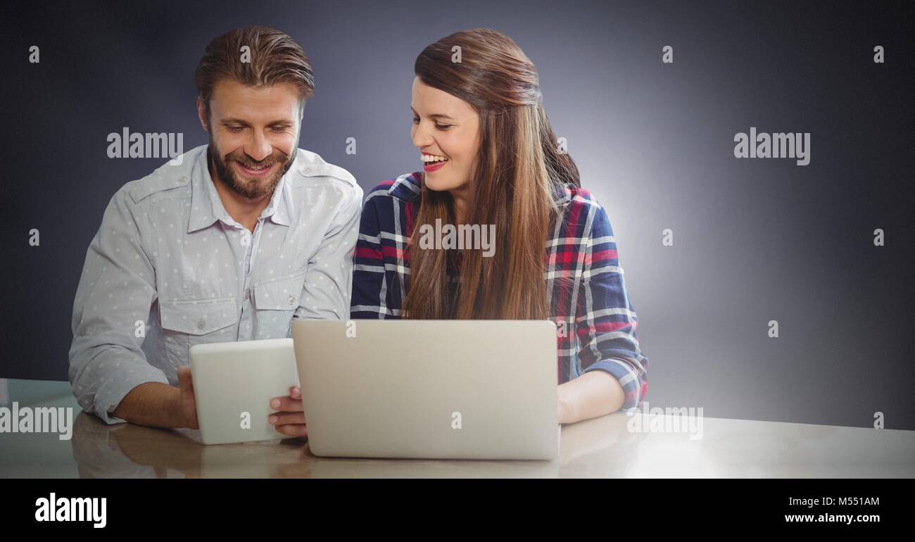 Young business couple working laptop hi-res stock photography and ...