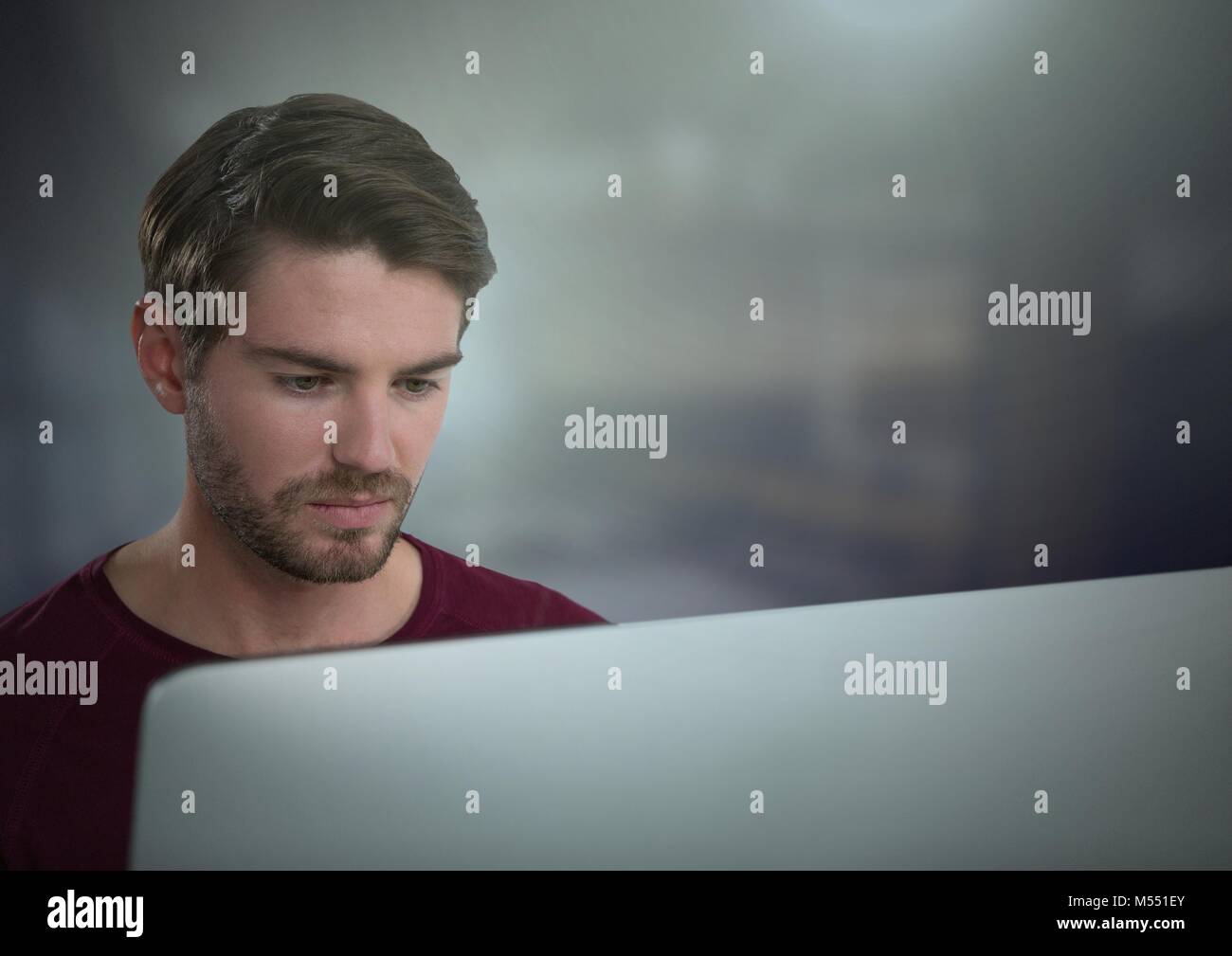 Businessman working on laptop Stock Photo - Alamy