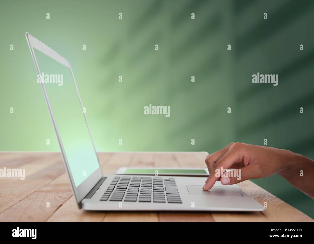 Hand working on laptop Stock Photo - Alamy