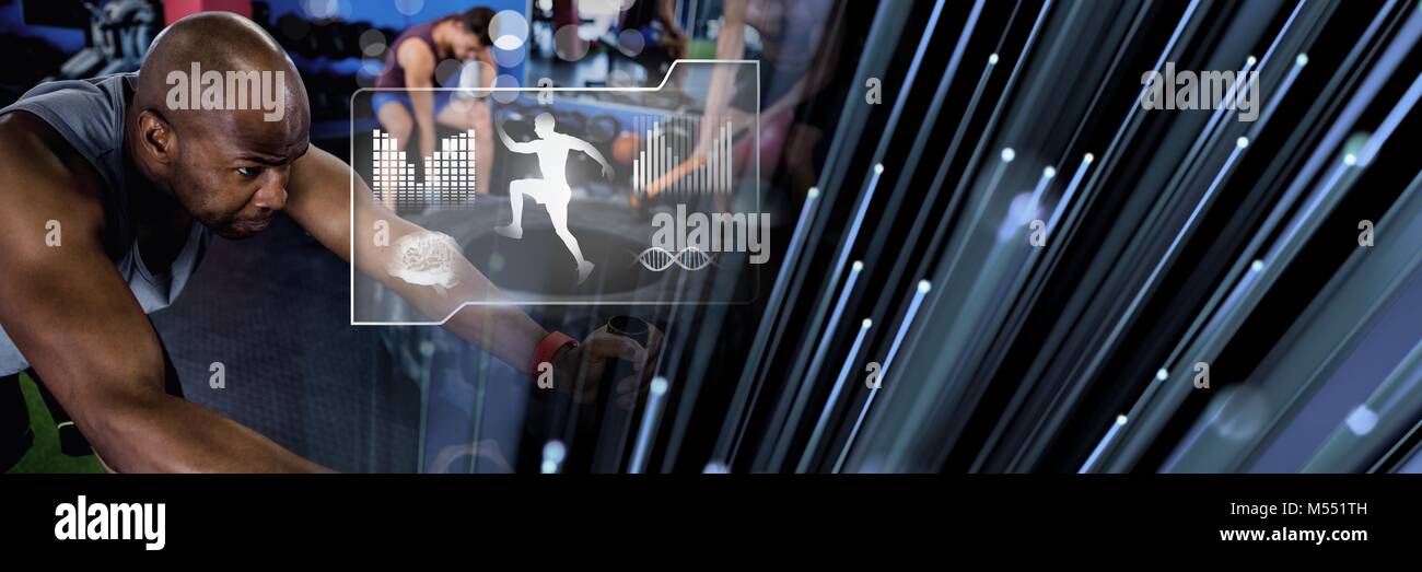 Athletic fit man in gym with health interface Stock Photo - Alamy