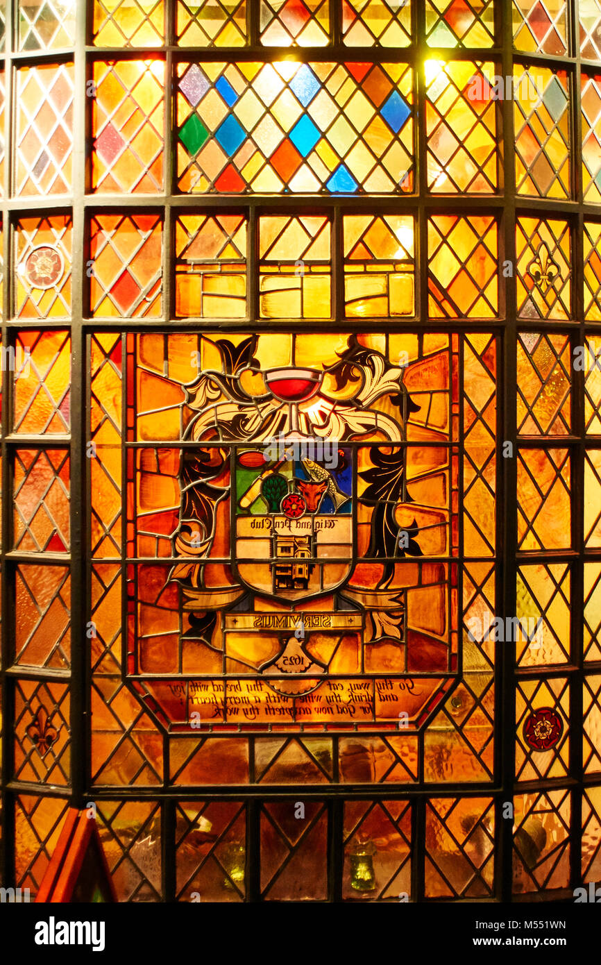 coat of arms in a stained glass window int eh traditional olde worlde ...
