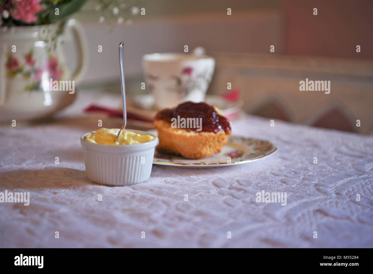 afternoon tea with vintage crockery scone jam and cream Stock Photo - Alamy