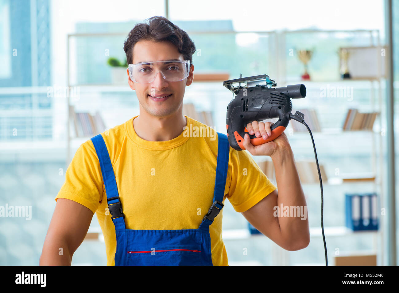Furniture carpenter working in the workshop Stock Photo - Alamy