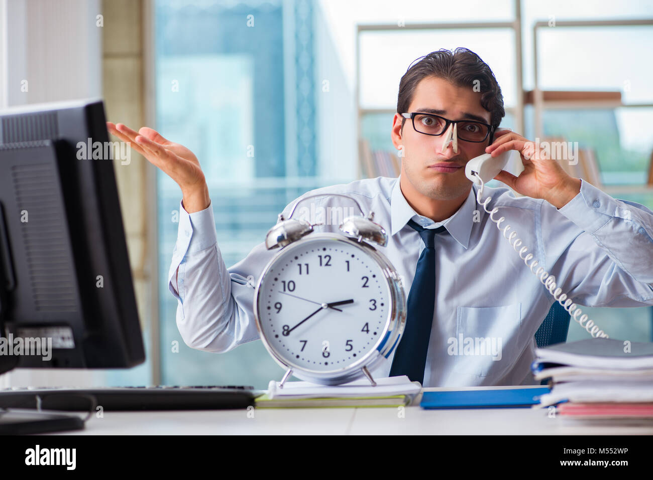 Businessman suffering from excessive armpit sweating Stock Photo - Alamy