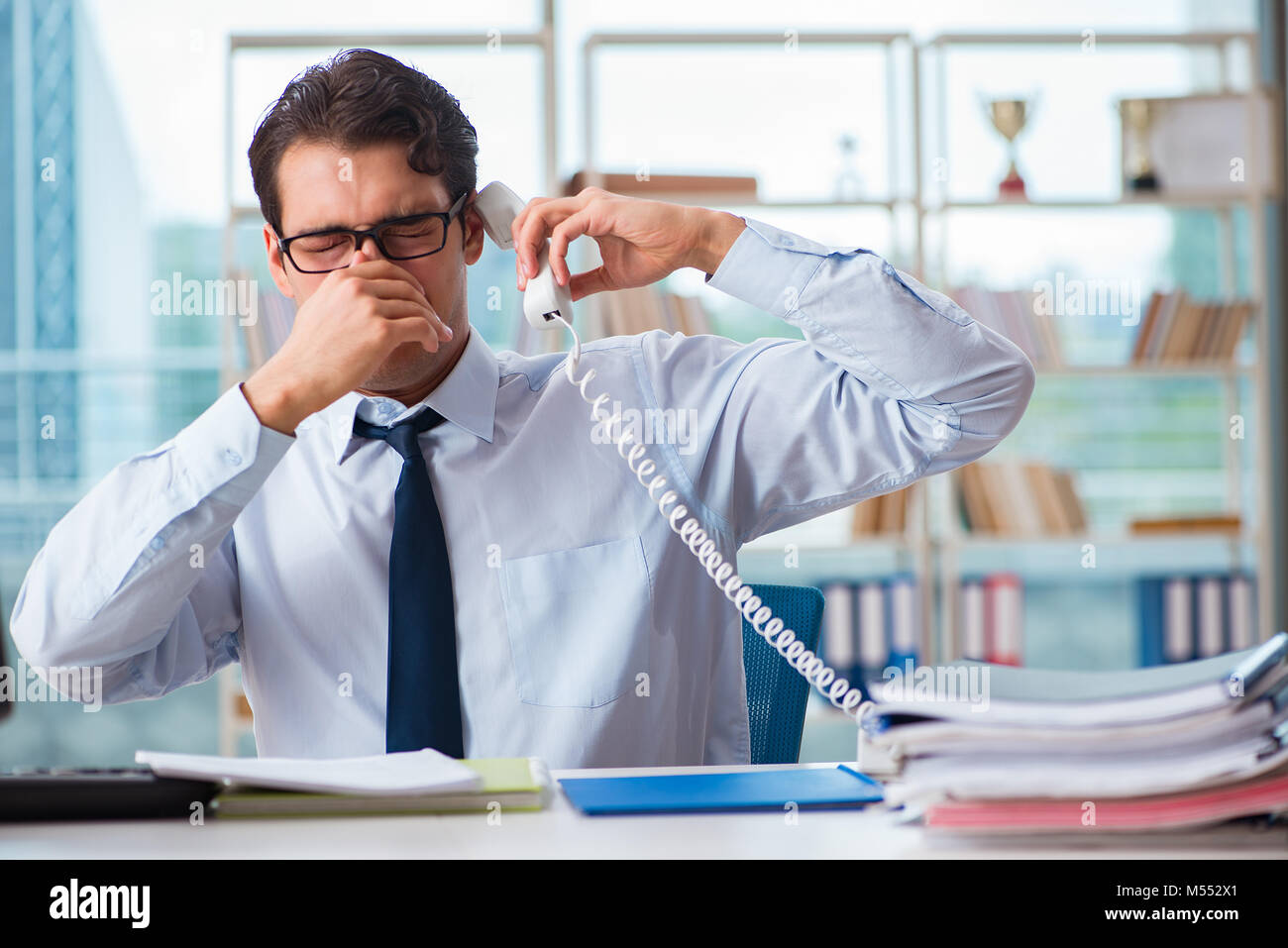 Businessman suffering from excessive armpit sweating Stock Photo - Alamy