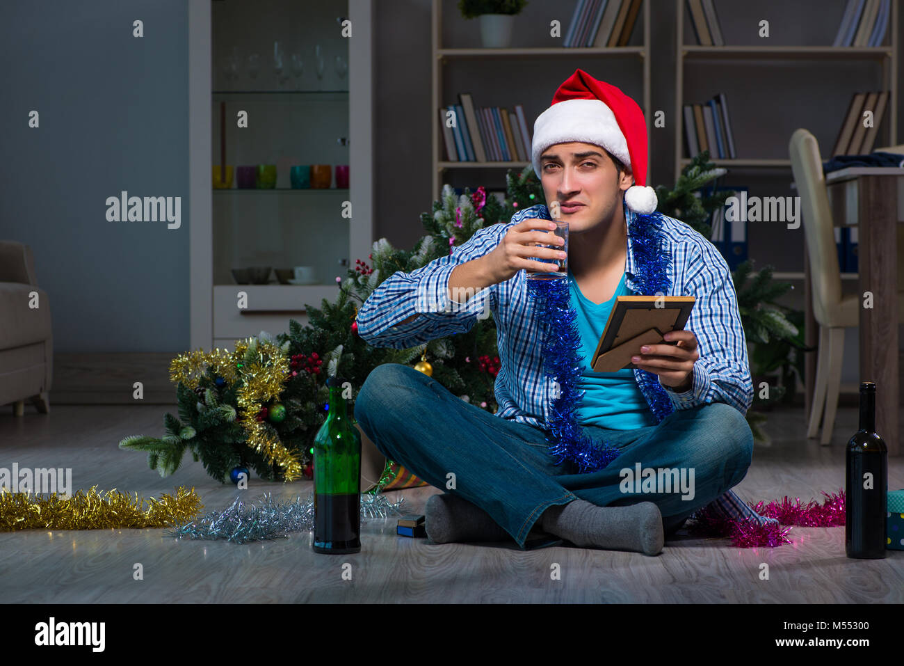 Man celebrating christmas at home alone Stock Photo - Alamy