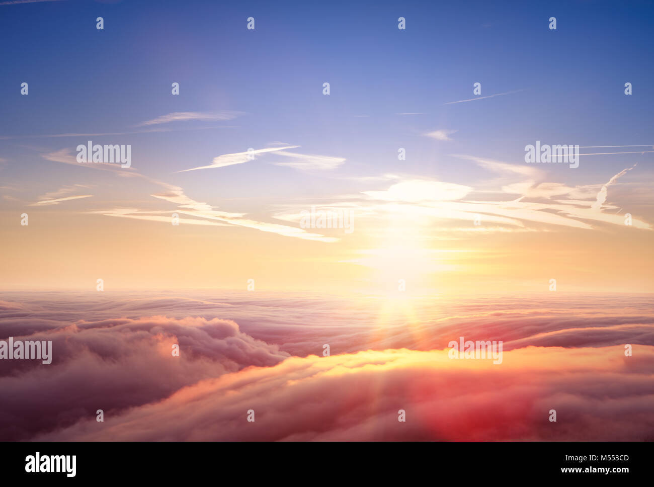 Beautiful aerial view above clouds with sunset. Airplane view Stock ...