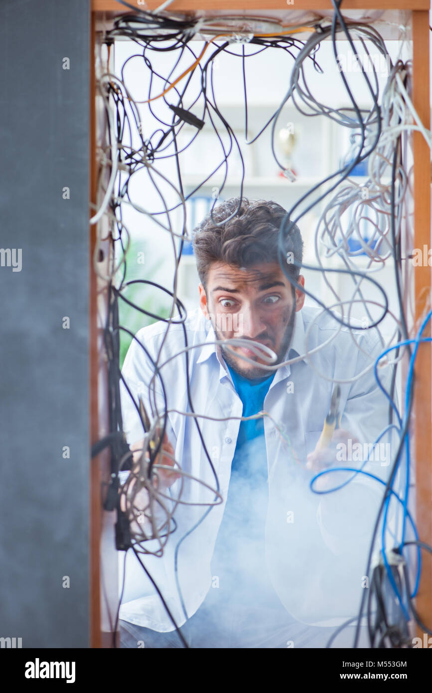 Untangle wires hi-res stock photography and images - Alamy