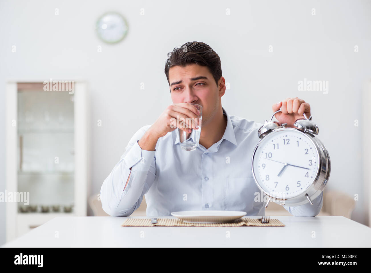 Angry man waiting food in hi-res stock photography and images - Alamy