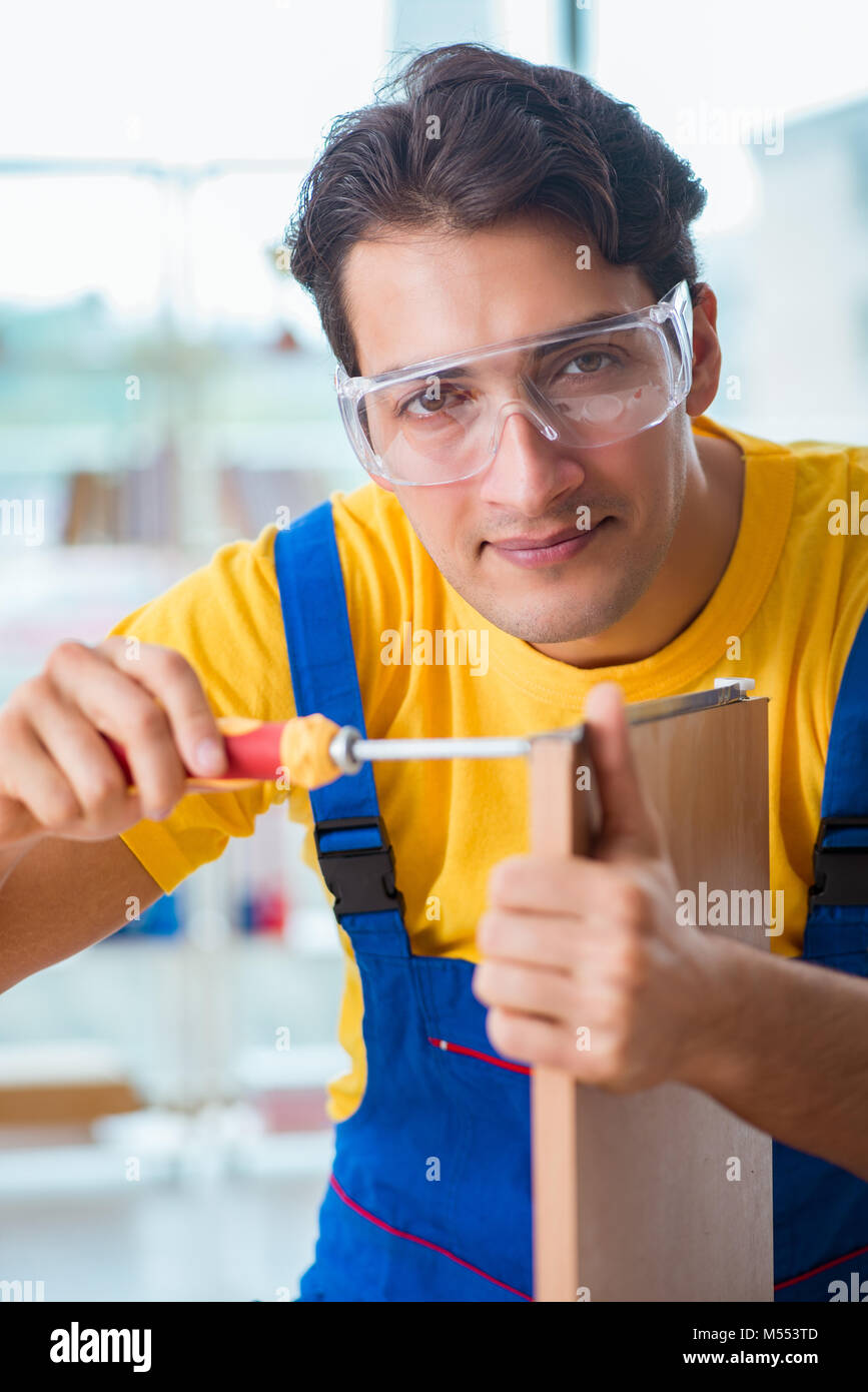 Furniture carpenter working in the workshop Stock Photo - Alamy