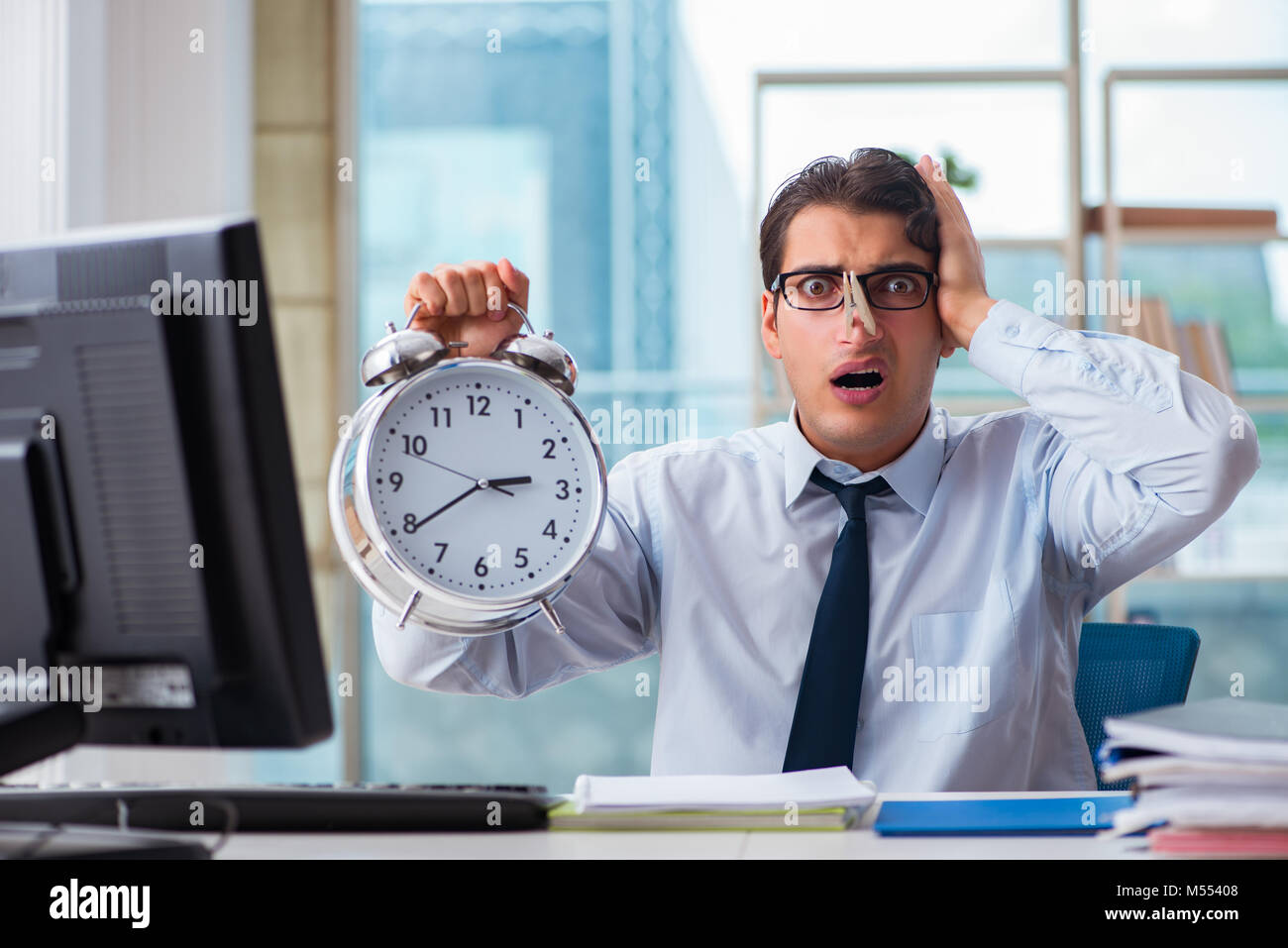 Businessman suffering from excessive armpit sweating Stock Photo - Alamy