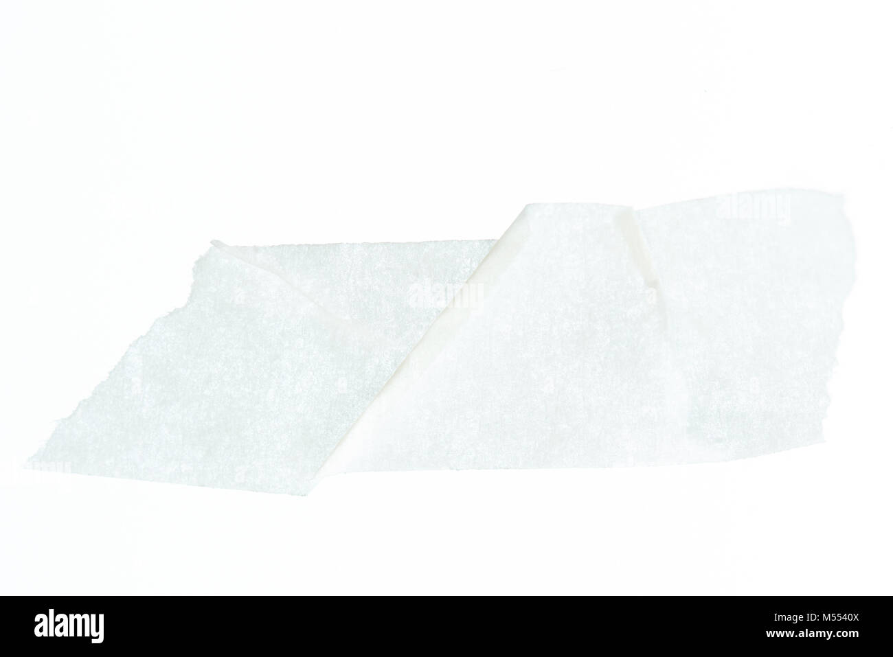 One wrinkled white masking tape piece close-up isolated Stock Photo - Alamy