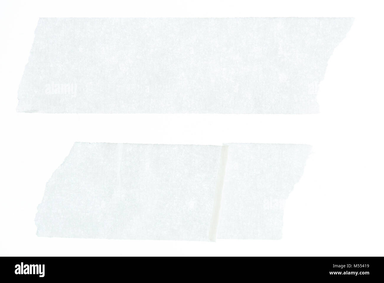 Lines of white masking tape close up view isolated Stock Photo - Alamy