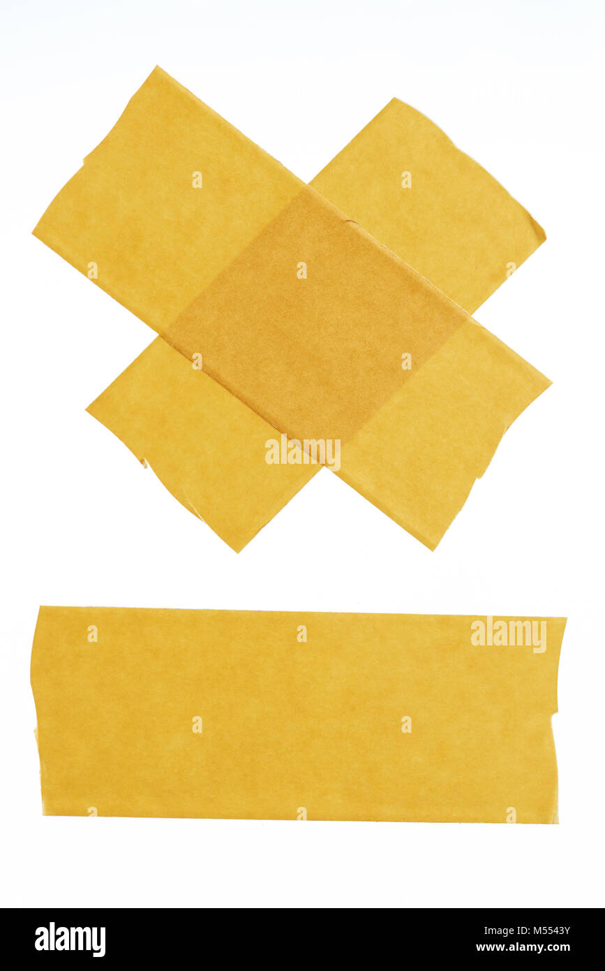 Line and cross shape from yellow masking tape isolated on white ...