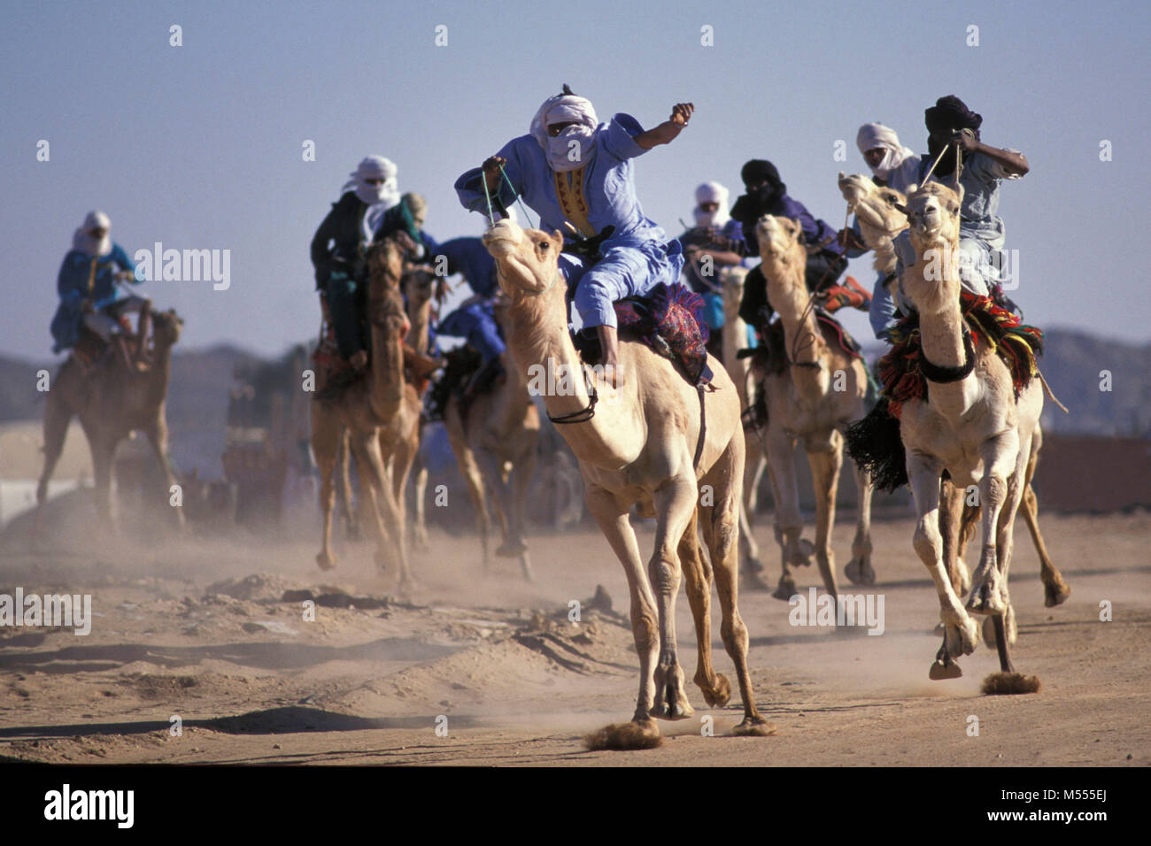 Algeria. Near Tamanrasset. Sahara desert. Men of Tuareg tribe ...