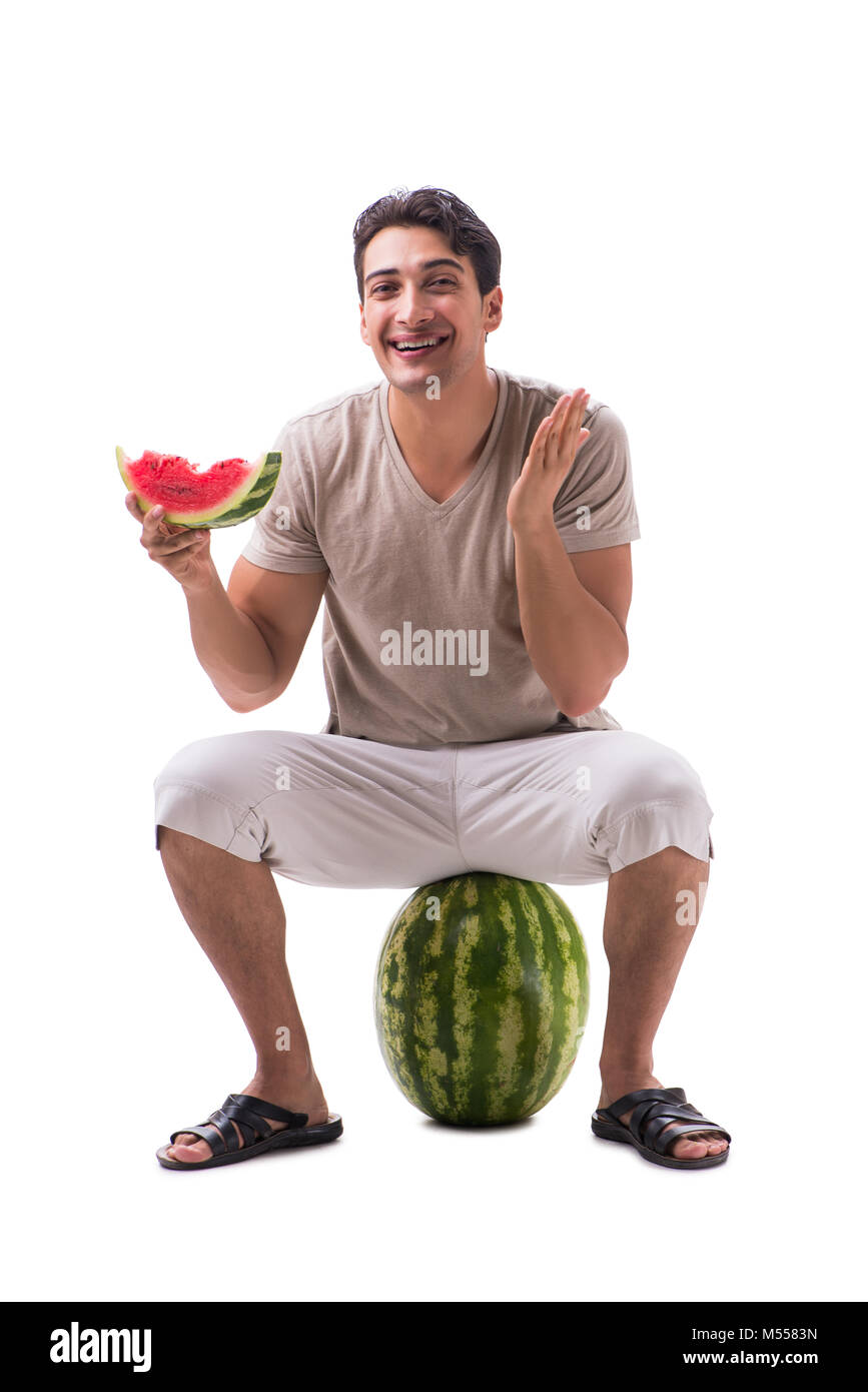 The young man with watermelon isolated on white Stock Photo - Alamy