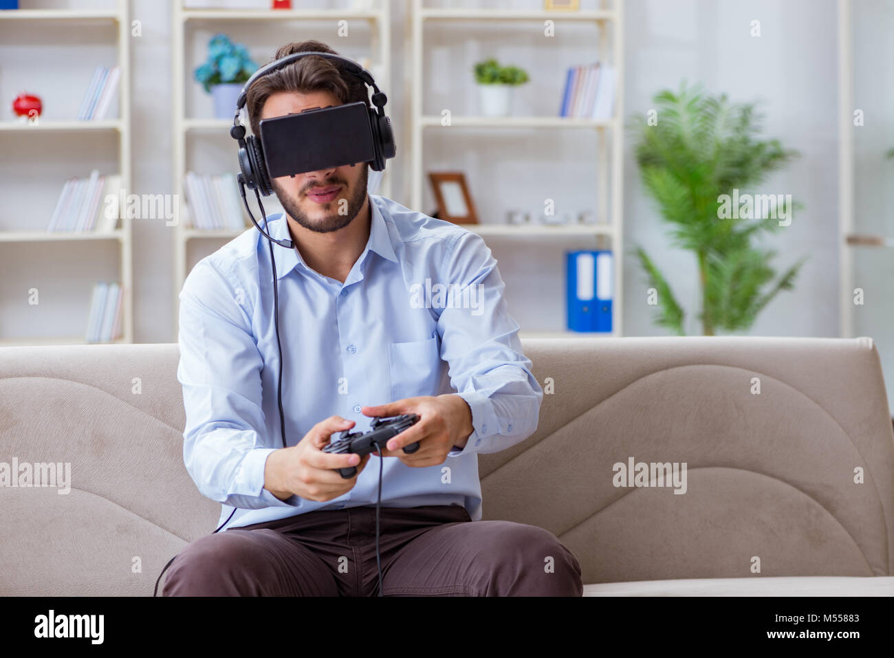 The student gamer playing games at home Stock Photo - Alamy