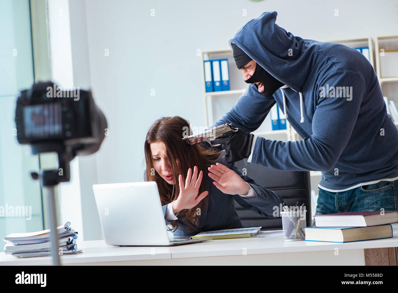 The criminal recording message for ransom with victim businesswoman ...