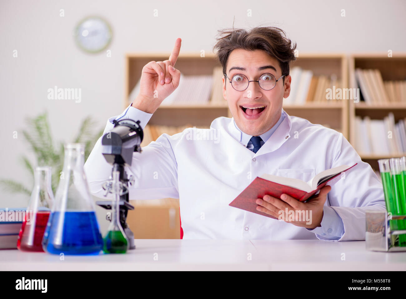 The mad crazy scientist doctor doing experiments in a laboratory Stock ...