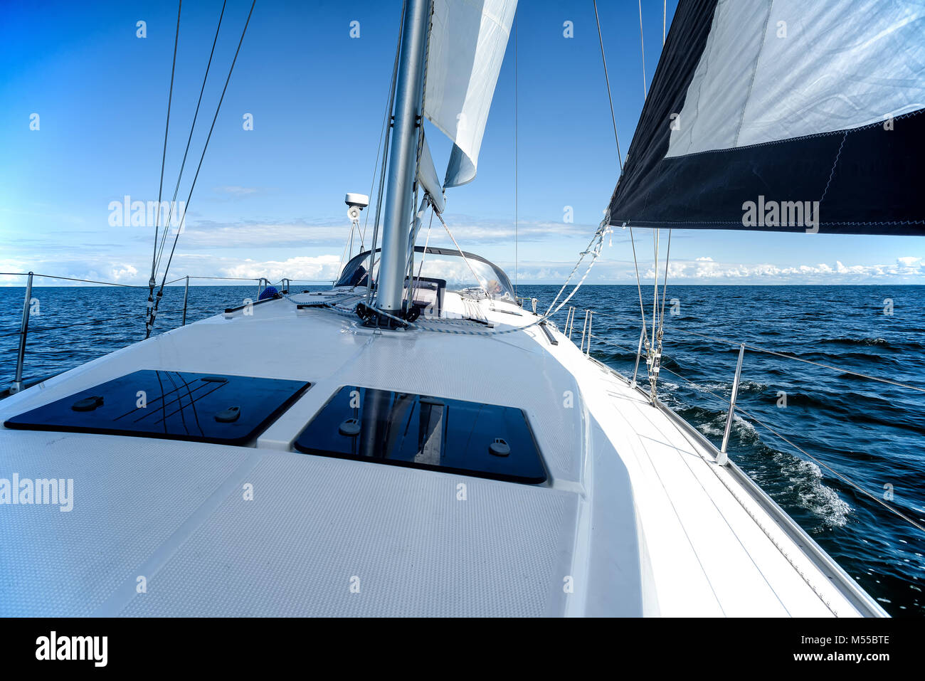 sailing yacht on the ocean Stock Photo - Alamy