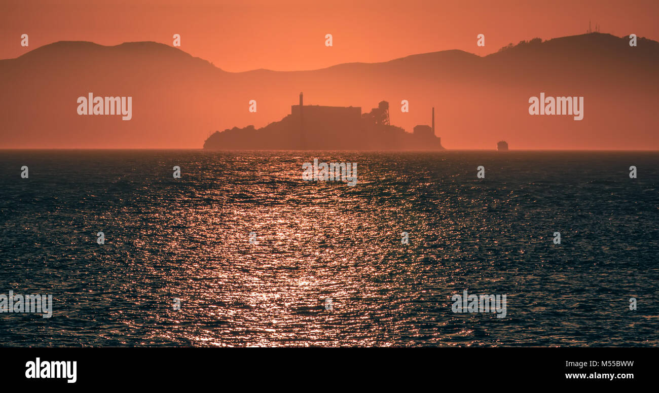 Alcatraz island prison San Francisco bay at sunset Stock Photo - Alamy