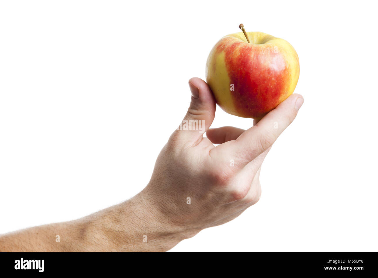 an apple holding by a male hand Stock Photo - Alamy