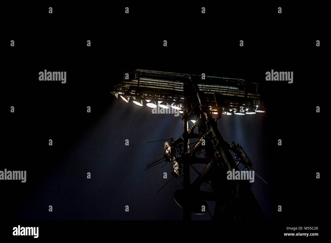 Big spotlights lighting tower at an sport arena stadium Stock Photo - Alamy