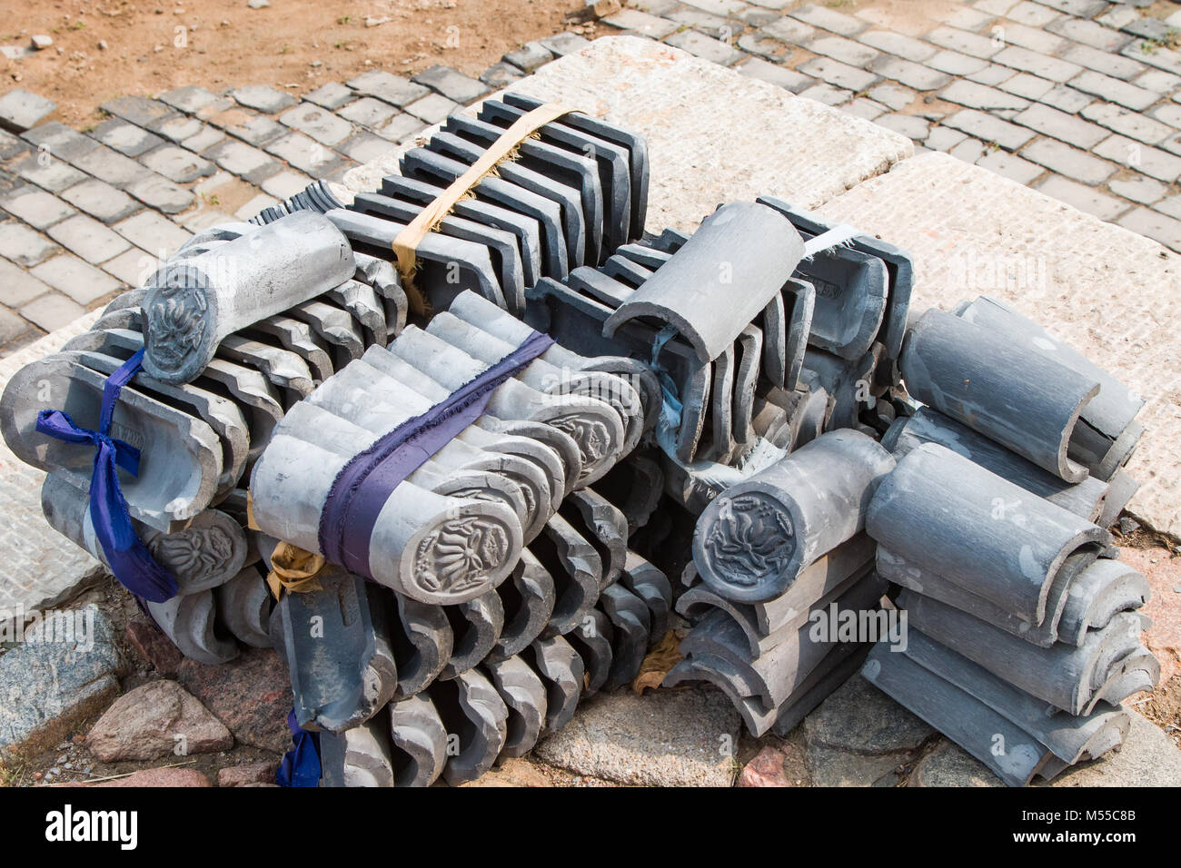 Stack of bundled roof shingles Stock Photo - Alamy
