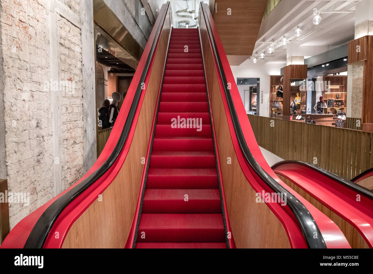 Close up of red escalators at T Fondaco Dei Tedeschi, newly Close up of red escalators at T ...