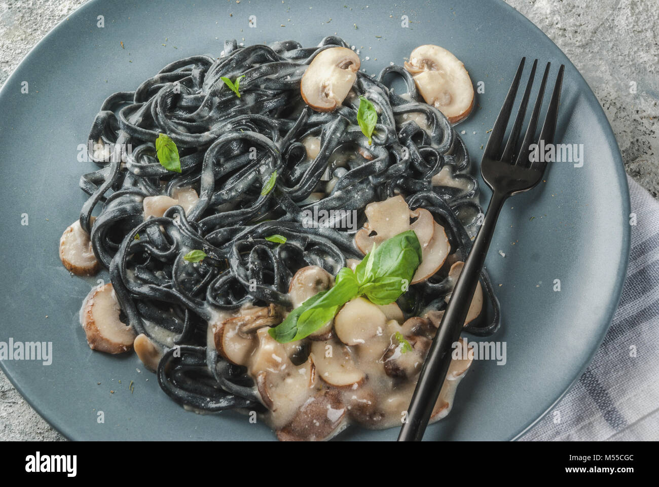 Modern italian dinner, Mediterranean food, black cuttlefish ink ...