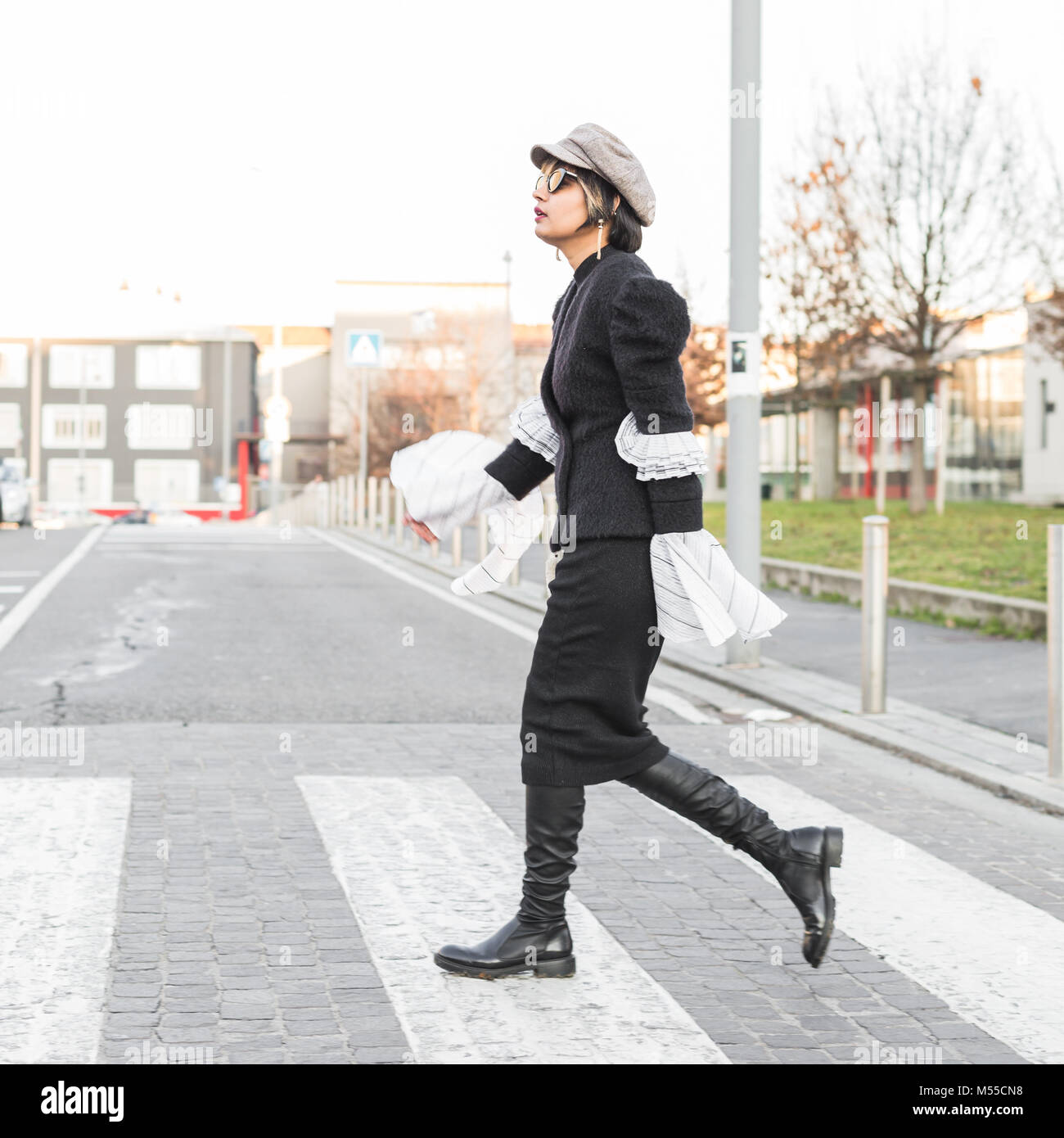 Indian woman crossing street hi-res stock photography and images - Alamy