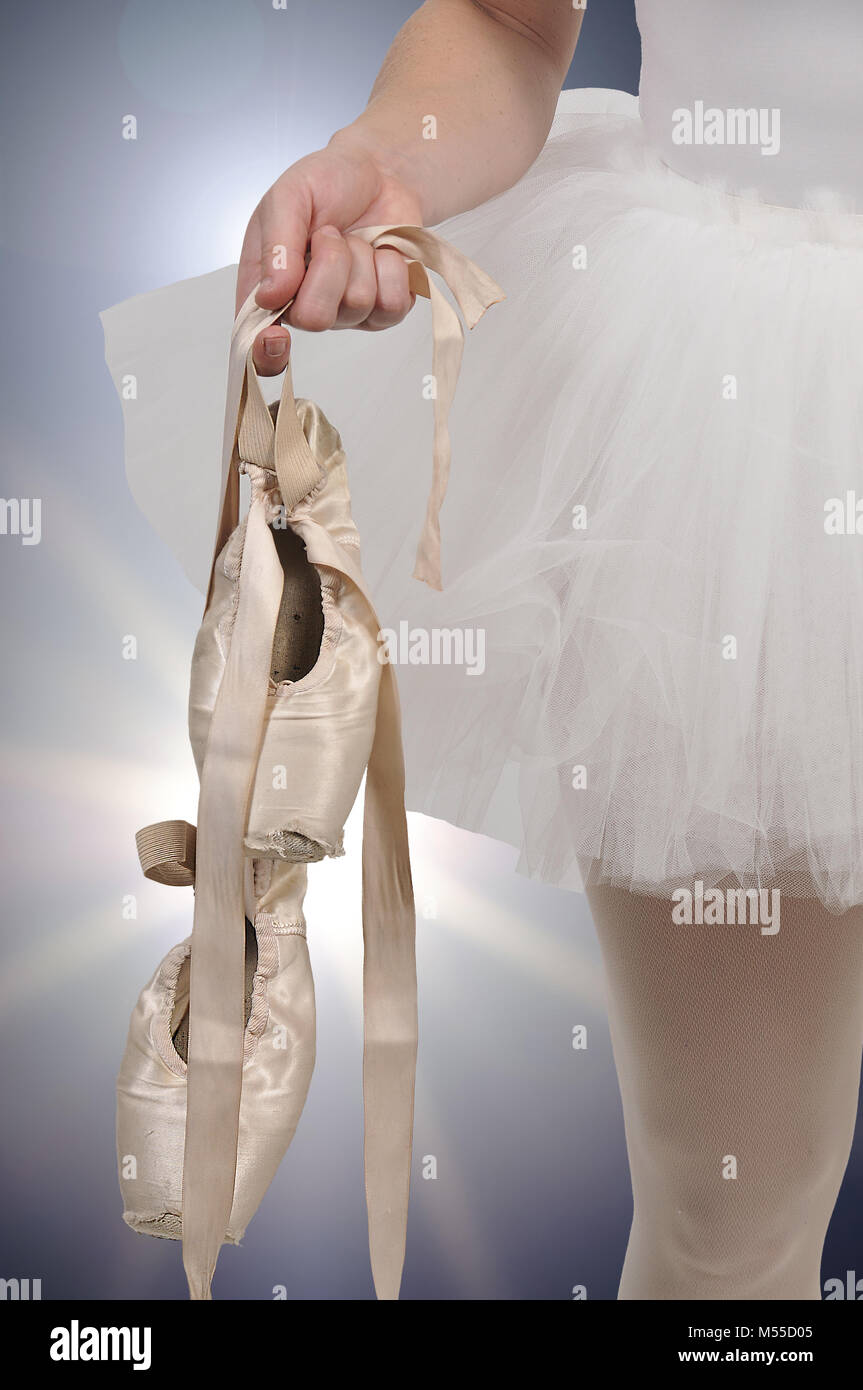 Woman ballerina with pointe shoes Stock Photo - Alamy
